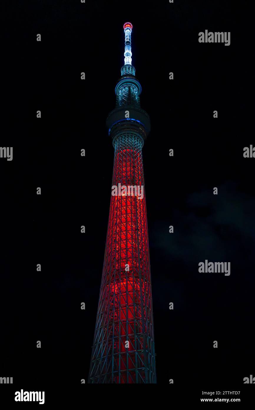 tokyo skytree tree lit up at night in the color red Stock Photo - Alamy