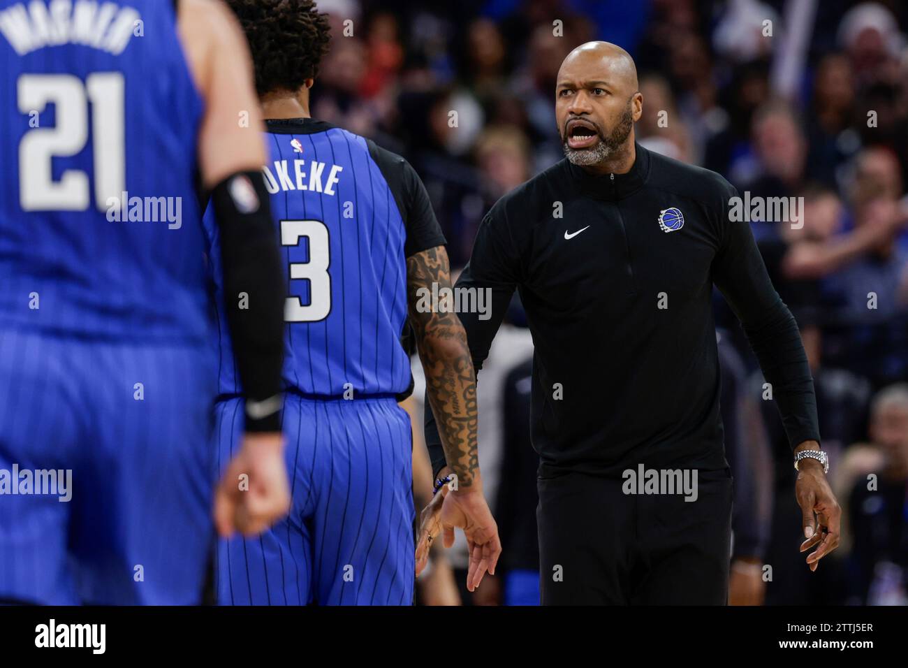 Orlando Magic head coach Jamahl Mosley talks to team after calling a ...