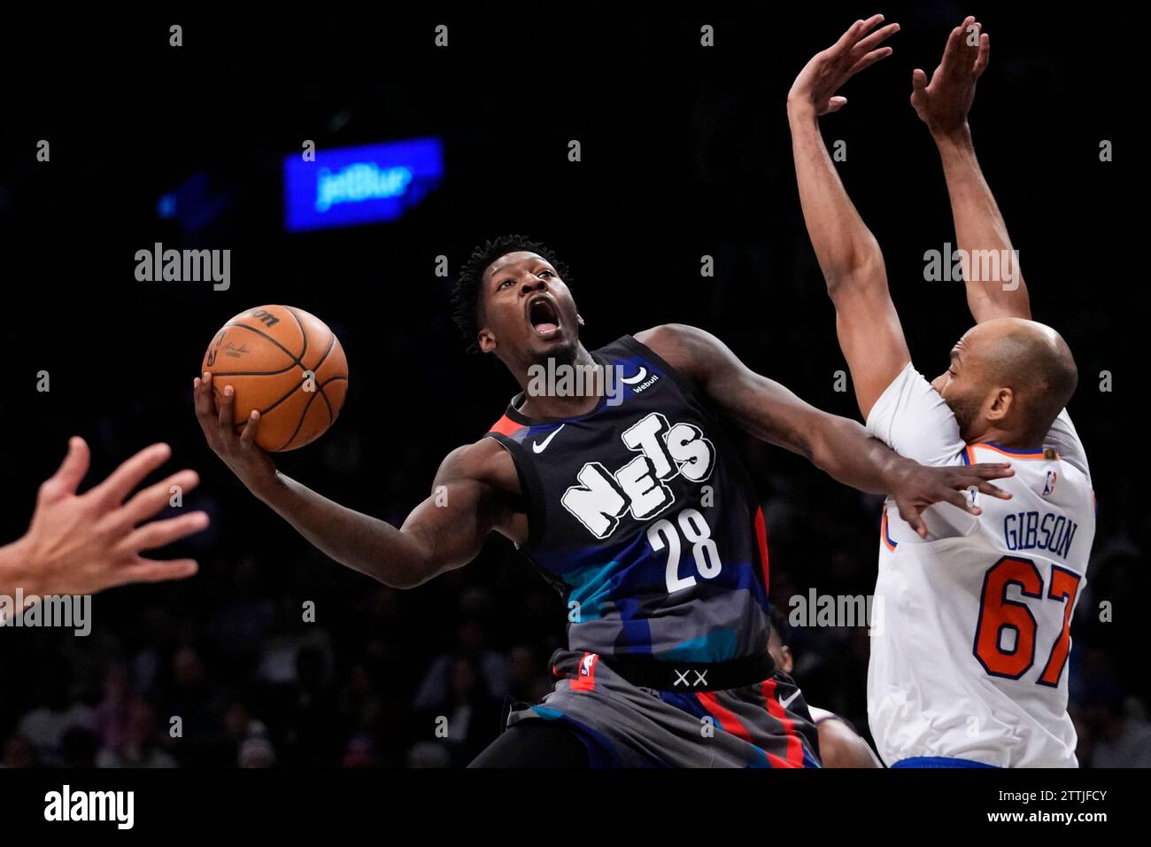New York Knicks' Taj Gibson (67) defends Brooklyn Nets' Dorian Finney ...