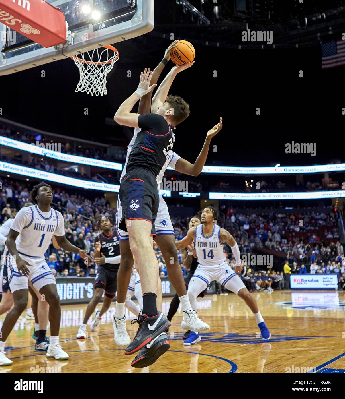 New Jersey on Wednesday, December 20, 2023. Connecticut Huskies center ...