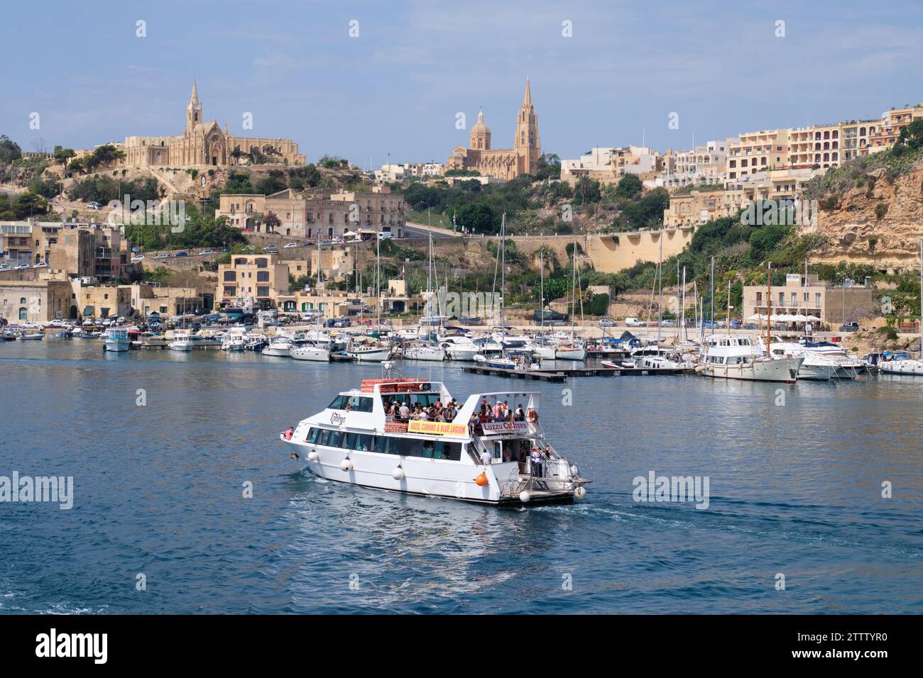This bustling harbour full of fishing boats is the first place which ...
