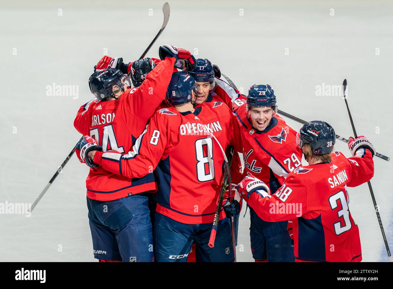 The Washington Capitals celebrate after center Dylan Strome (17) scored ...
