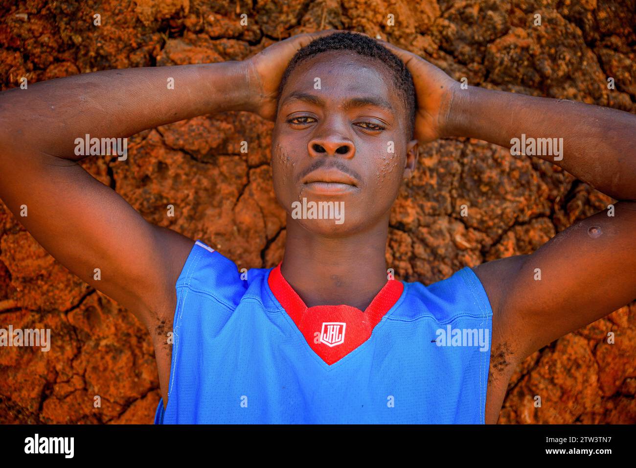 Nairobi, Kenya. 18th Dec, 2023. A young man is posed for a photo by the ...