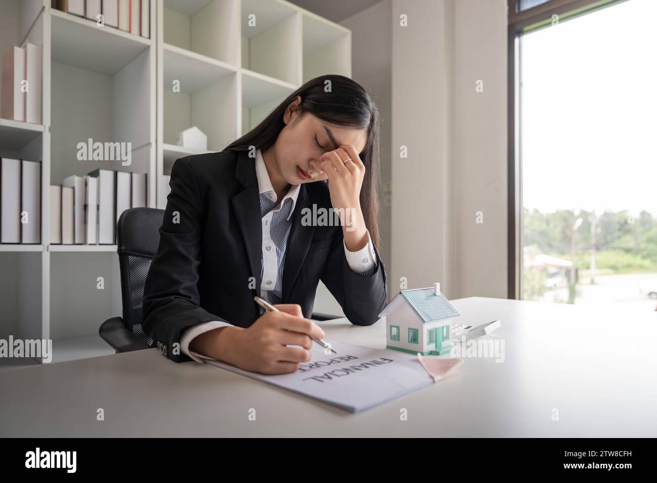 Asia Business woman stress from work investment in real estate, There ...