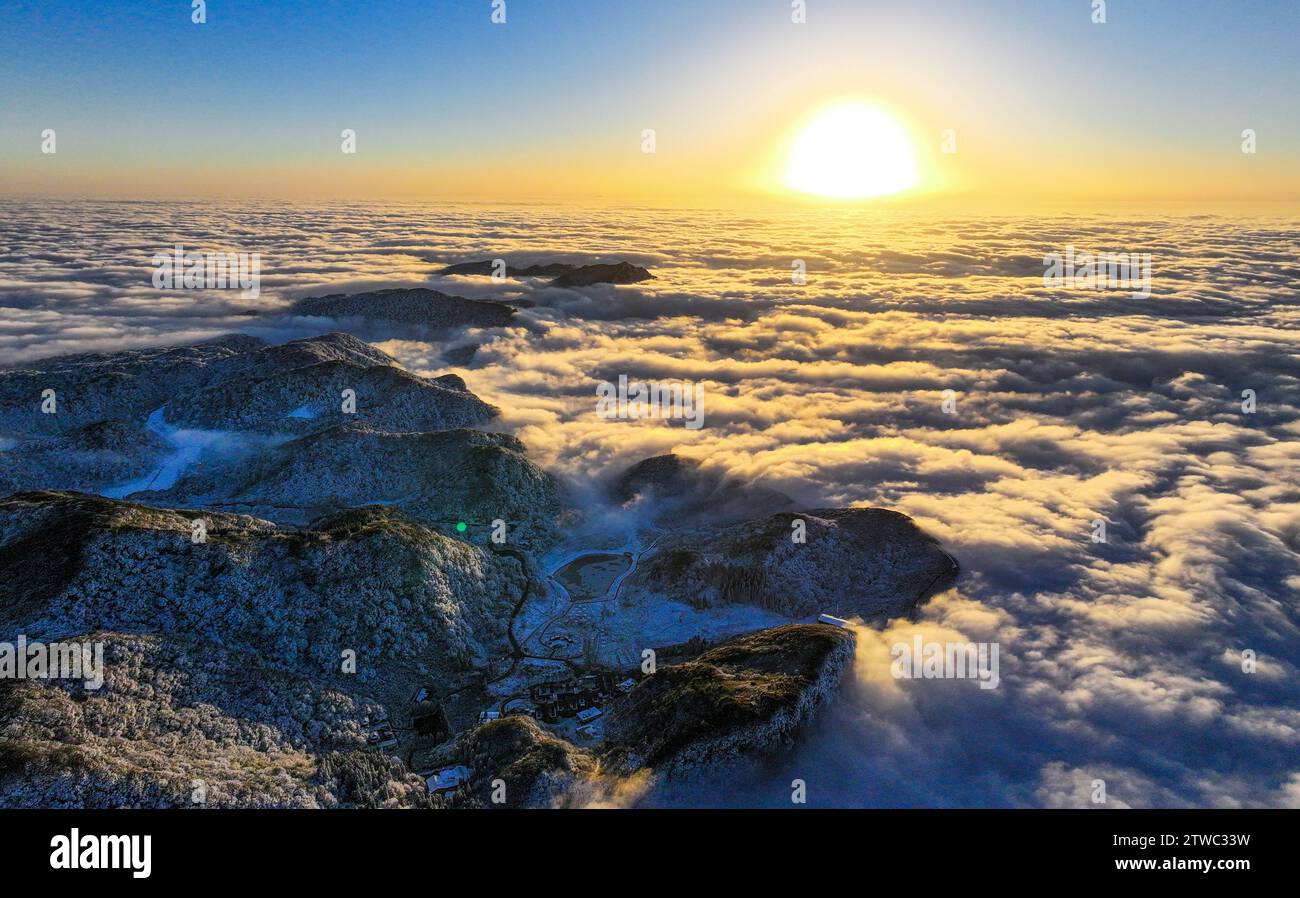 CHONGQING, CHINA - DECEMBER 20, 2023 - A sunset and sea of clouds is ...