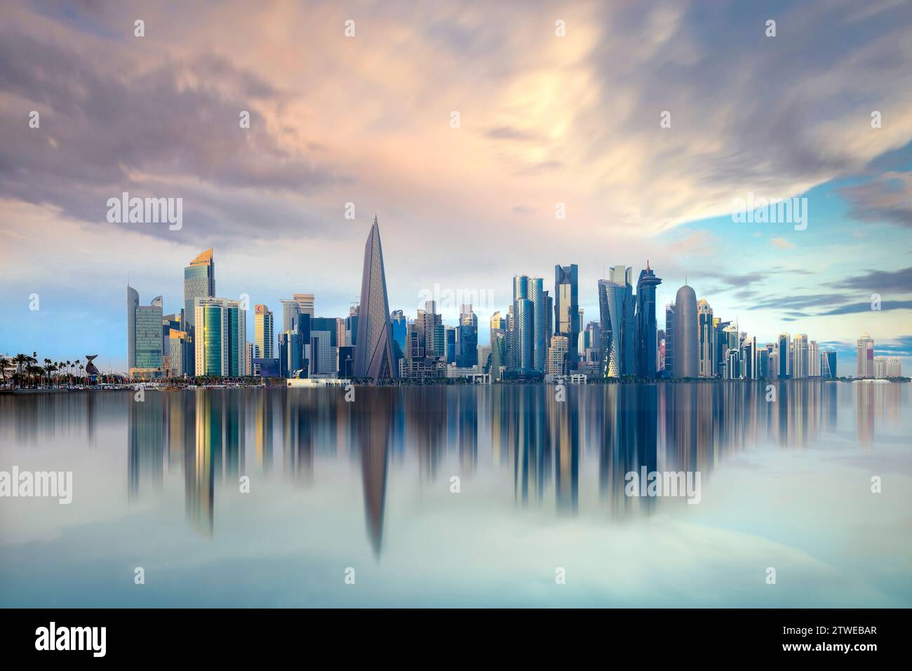 The Panoramic skyline of Doha, Qatar during sunset Stock Photo - Alamy