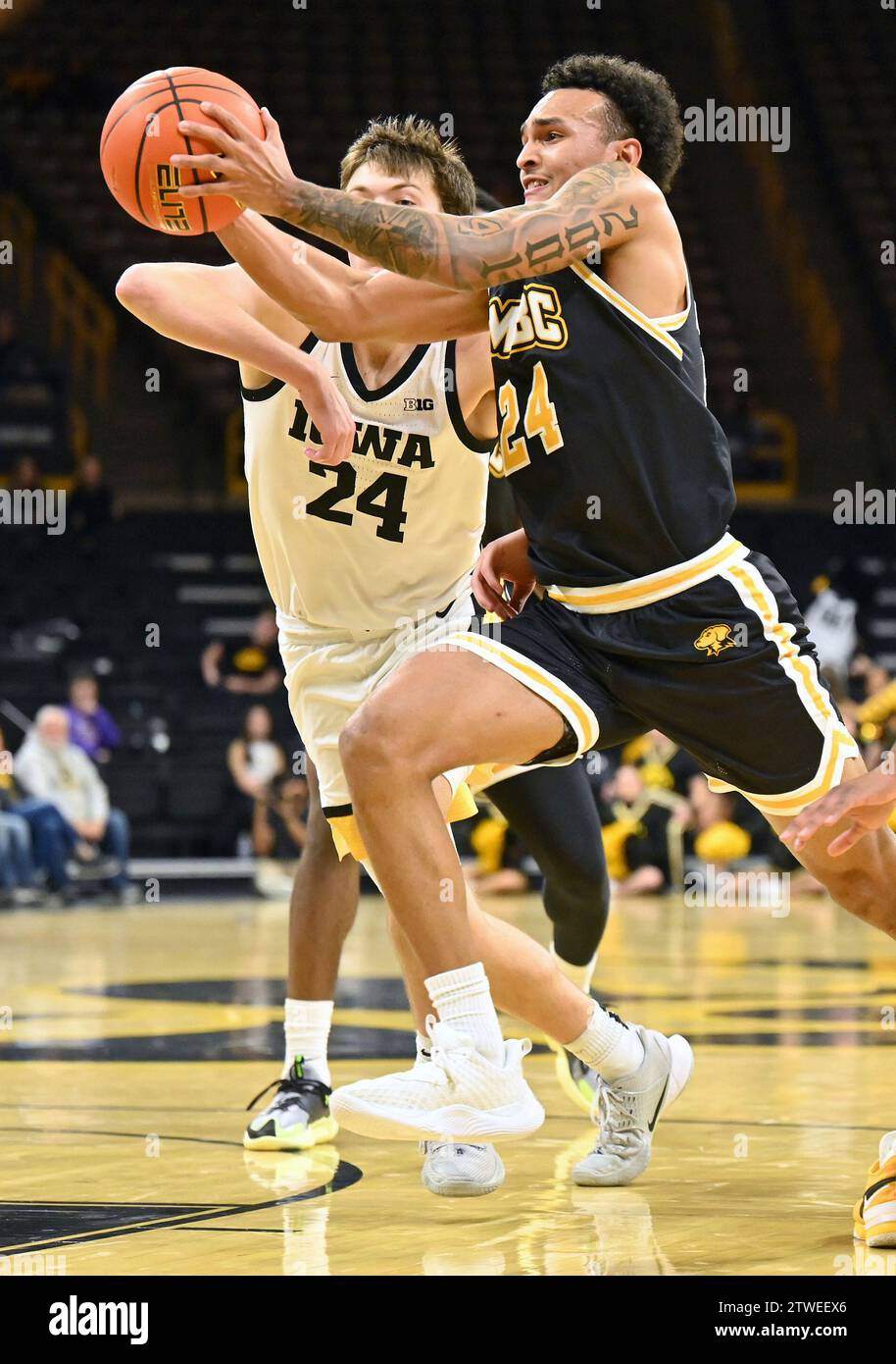 IOWA CITY, IA - DECEMBER 20: UMBC guard Marcus Banks Jr (24) drives to the basket as Iowa ...
