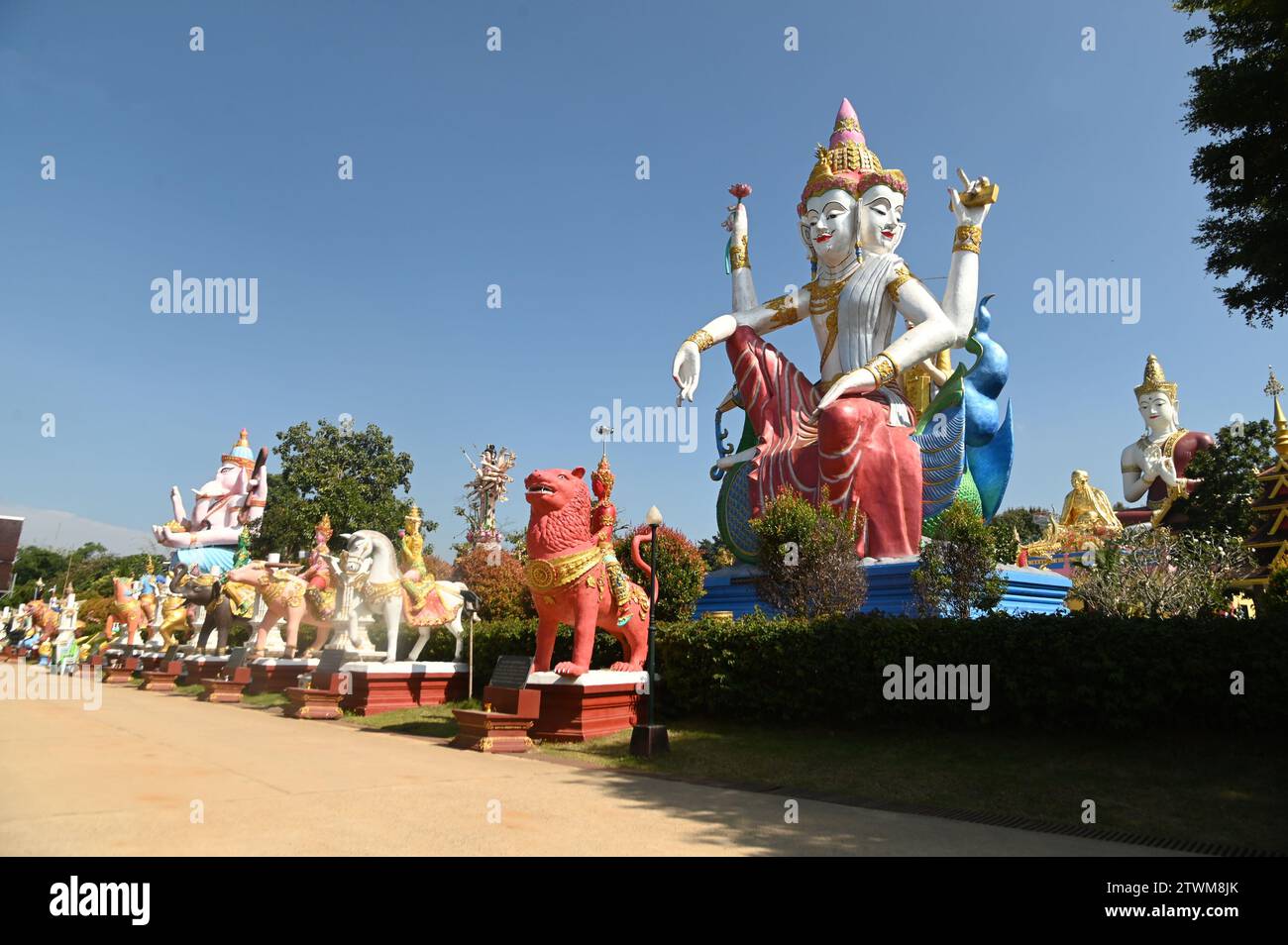 A large outdoor four-faced and four-hands Brahma statue represents the ...