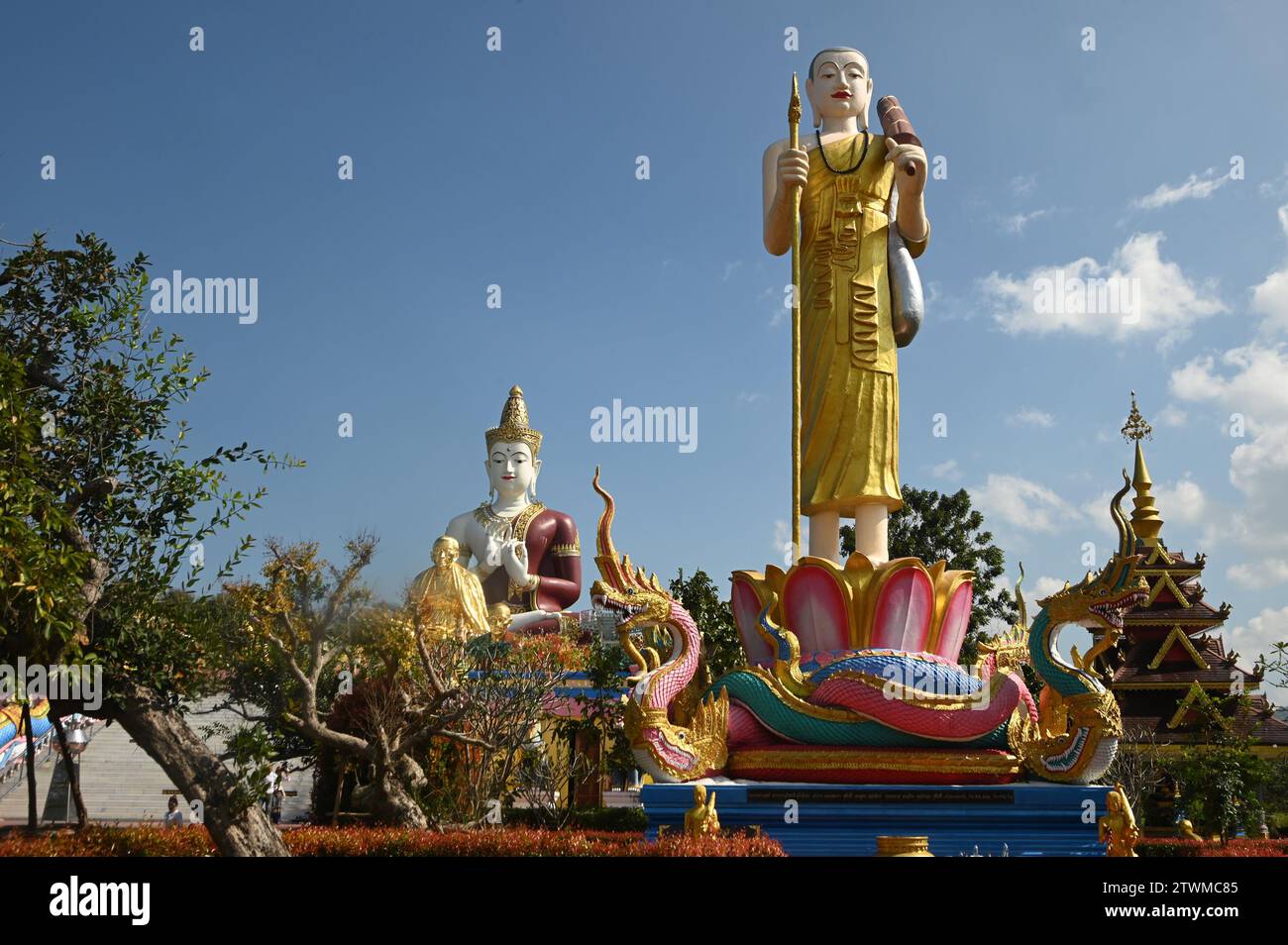 An outdoor statue of Phra Siwali is decorated for Buddhists to admire and there is a Phra Sri ...