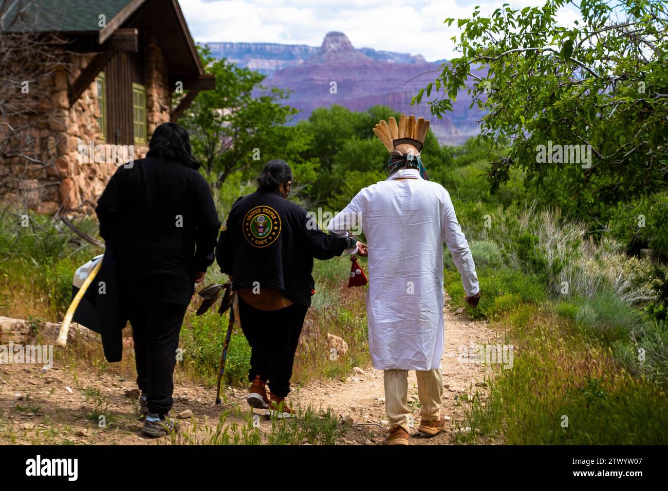 FILE - Members of the Havasupai Tribe walk down to a popular campground ...