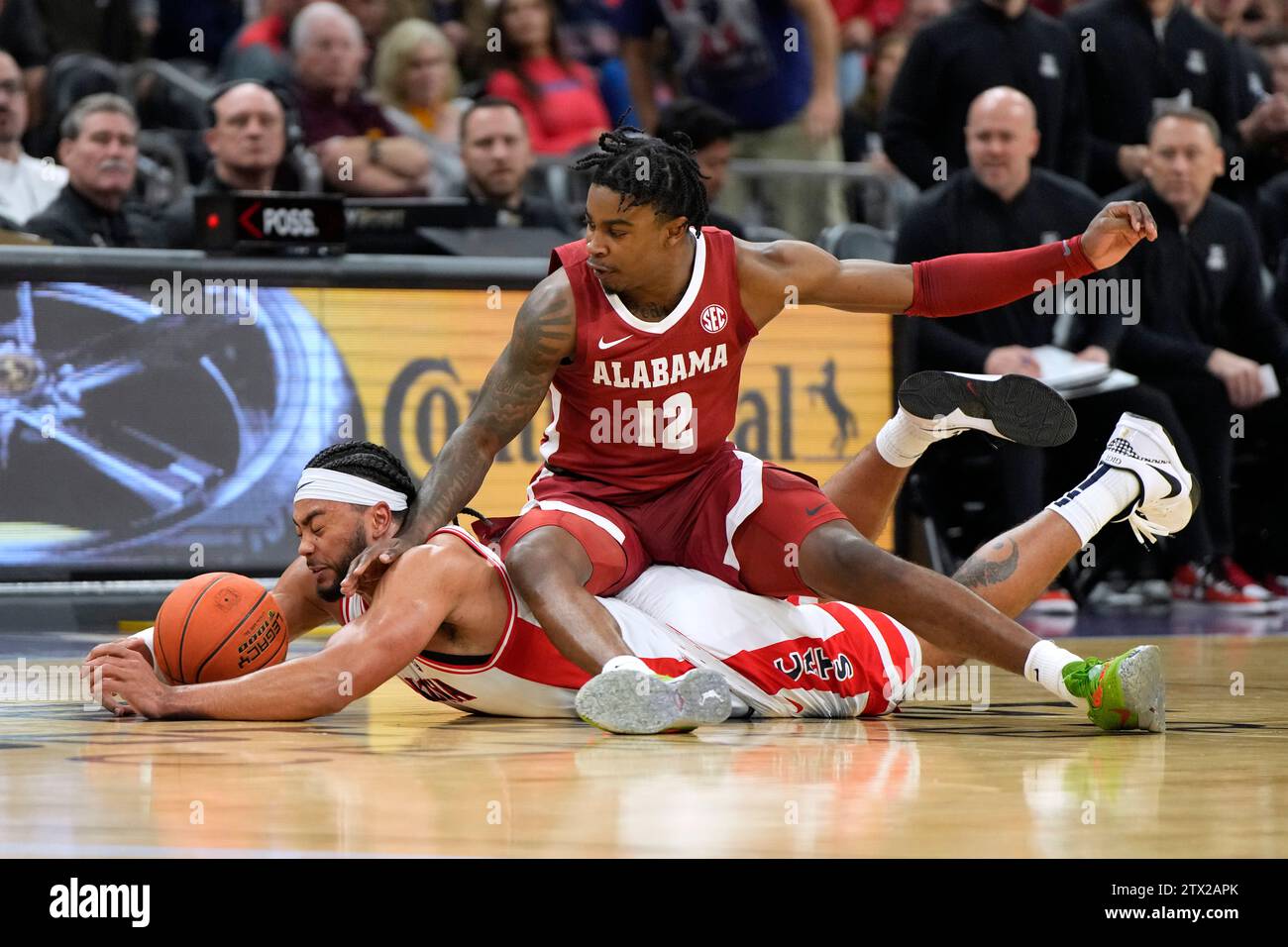 Arizona guard Kylan Boswell and Alabama guard Latrell Wrightsell Jr ...