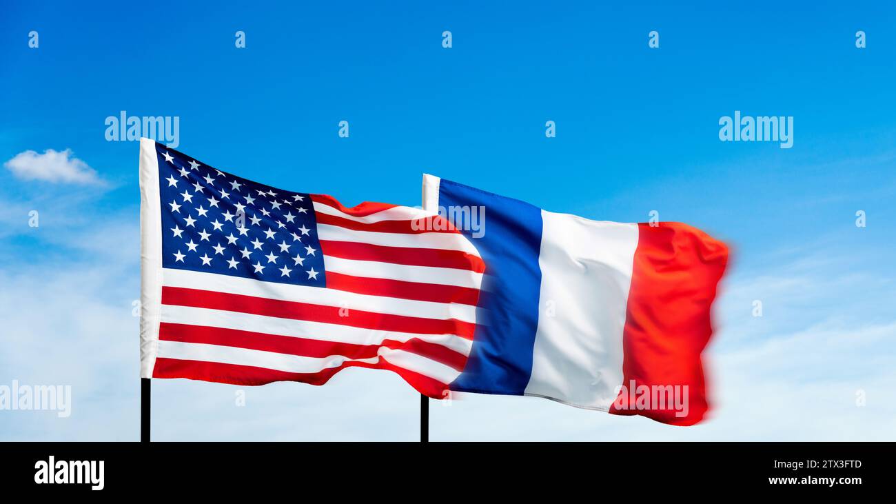 USA and France flags against blue sky background Stock Photo - Alamy