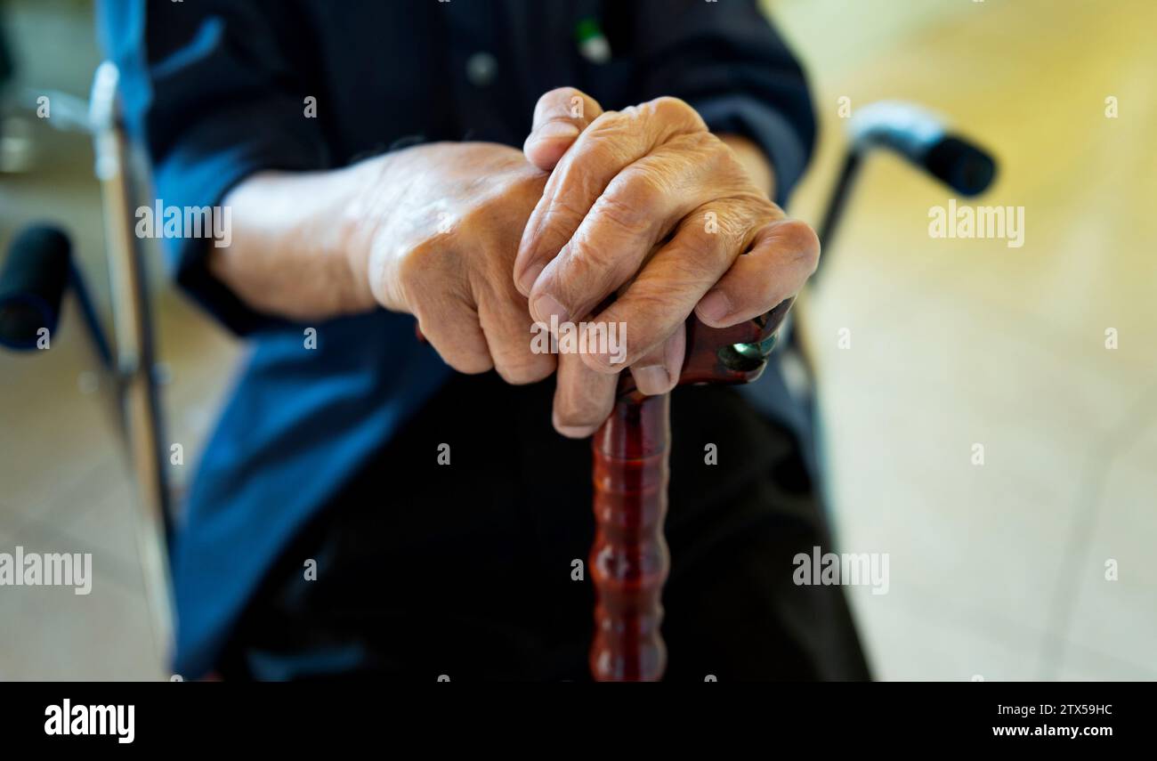 Old chinese man walking stick hi-res stock photography and images - Alamy