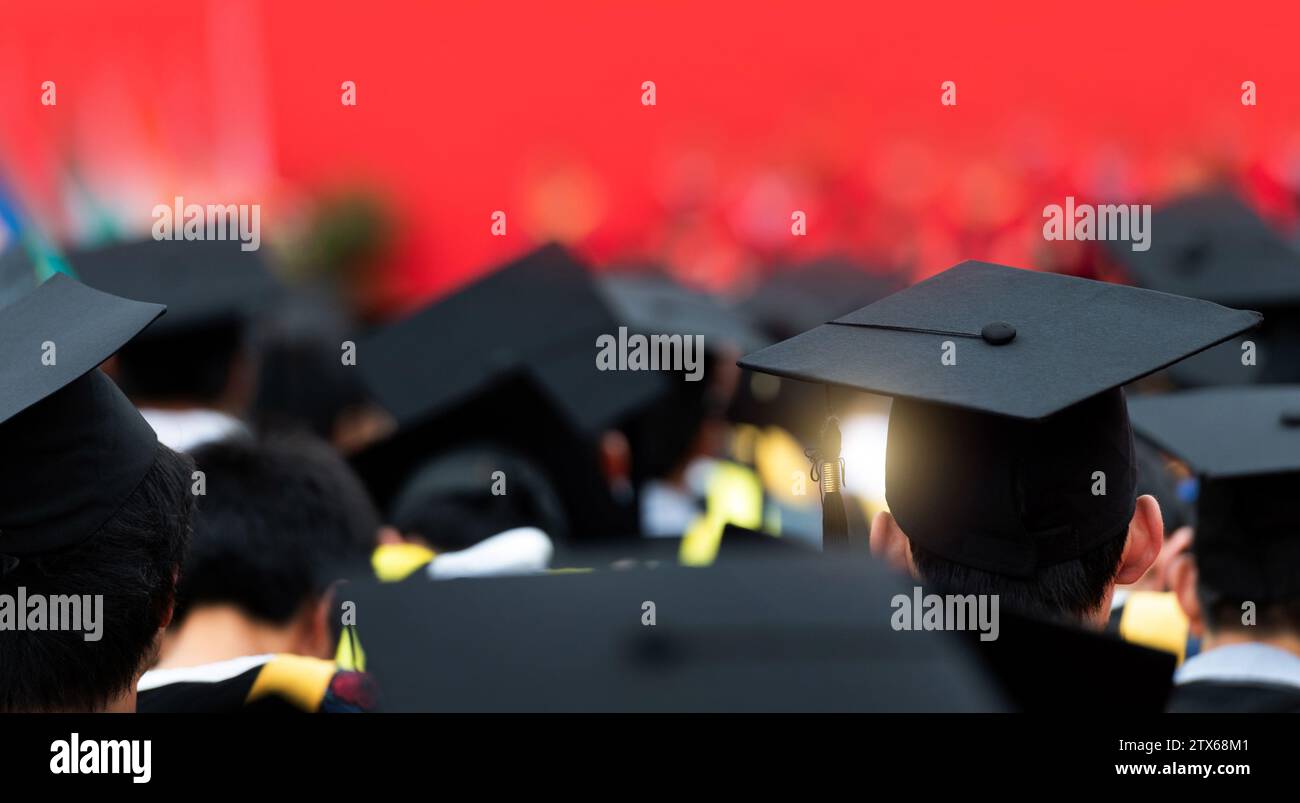 Back view of graduates during commencement Stock Photo - Alamy