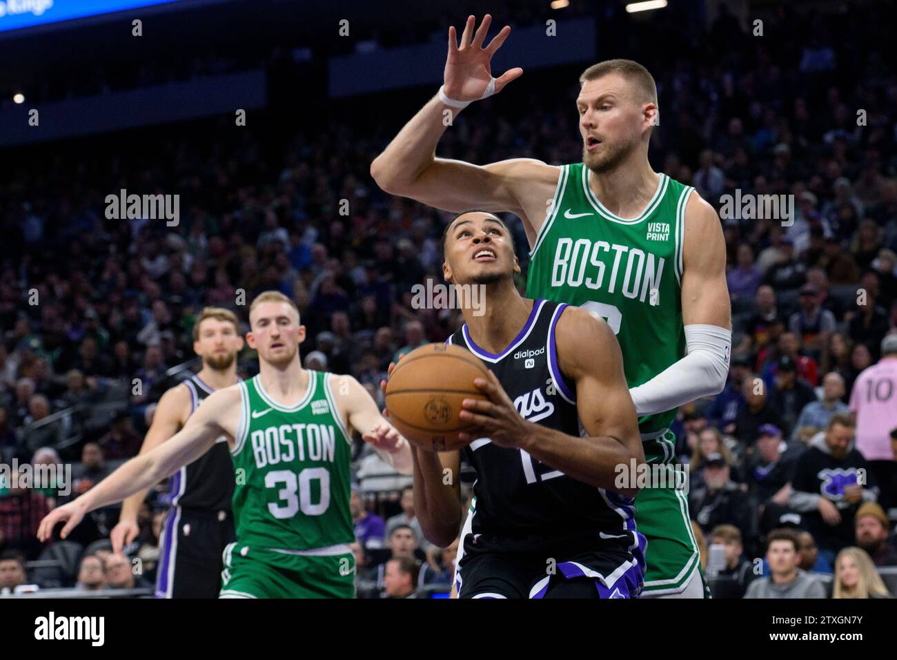 Sacramento Kings forward Keegan Murray is guarded by Boston Celtics ...