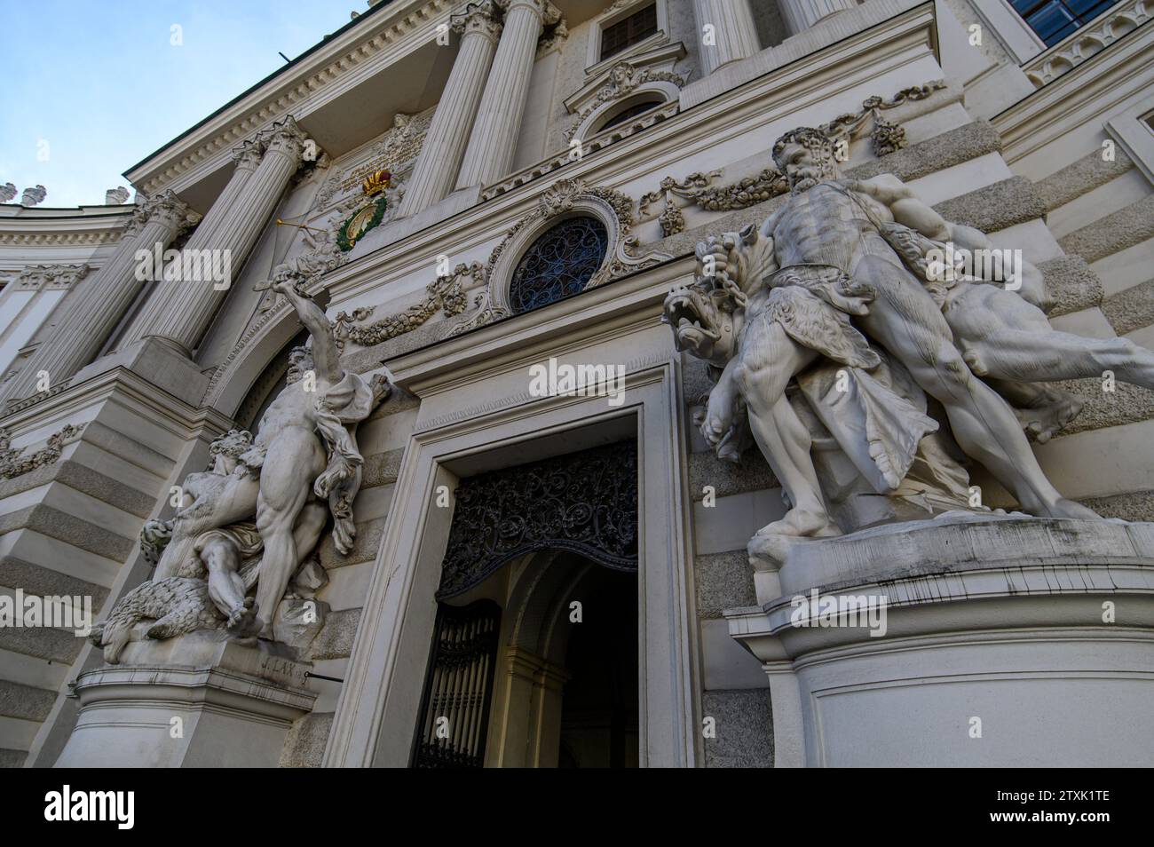 Vienna, Austria. Baroque statues on the entrance gate of St. Michael's ...