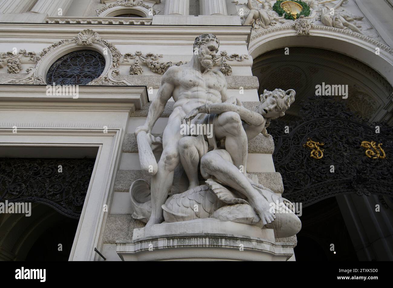 Vienna, Austria. Baroque statues on the entrance gate of St. Michael's ...