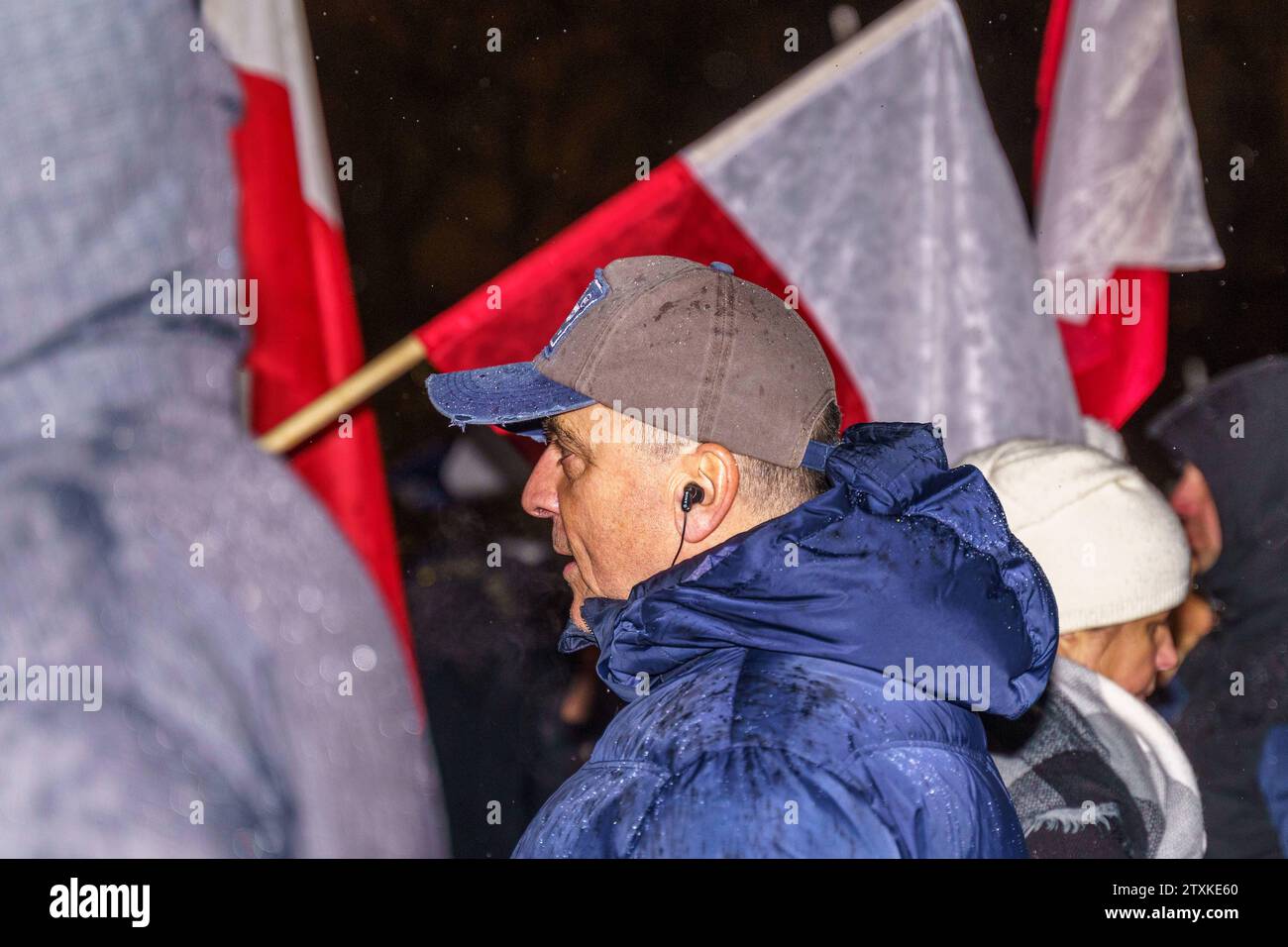 People wave Poland s national flags as they protest outside the State ...