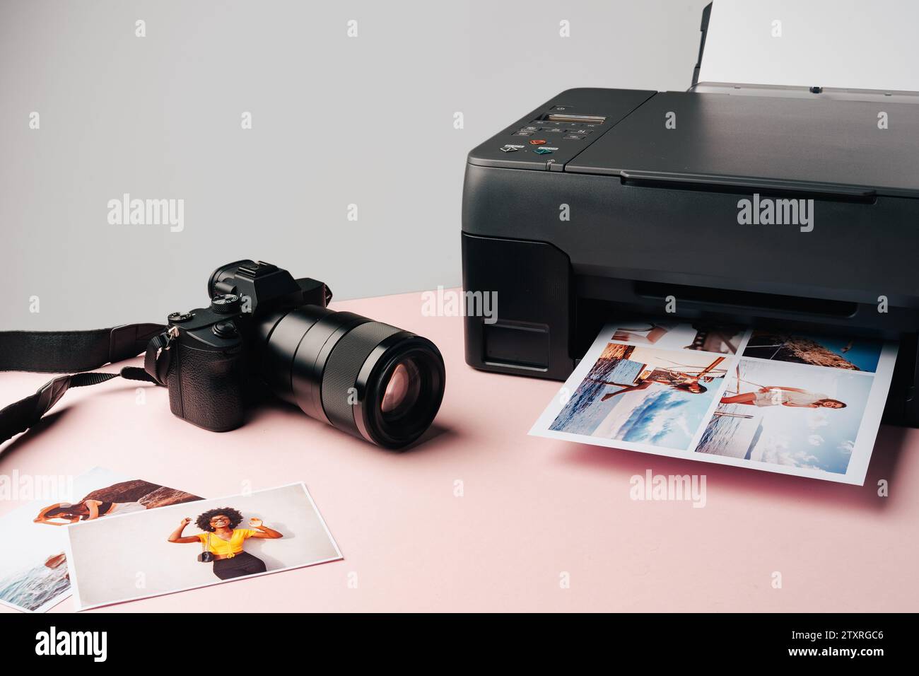 Printer and photo camera on table. Printing photos concept Stock Photo ...