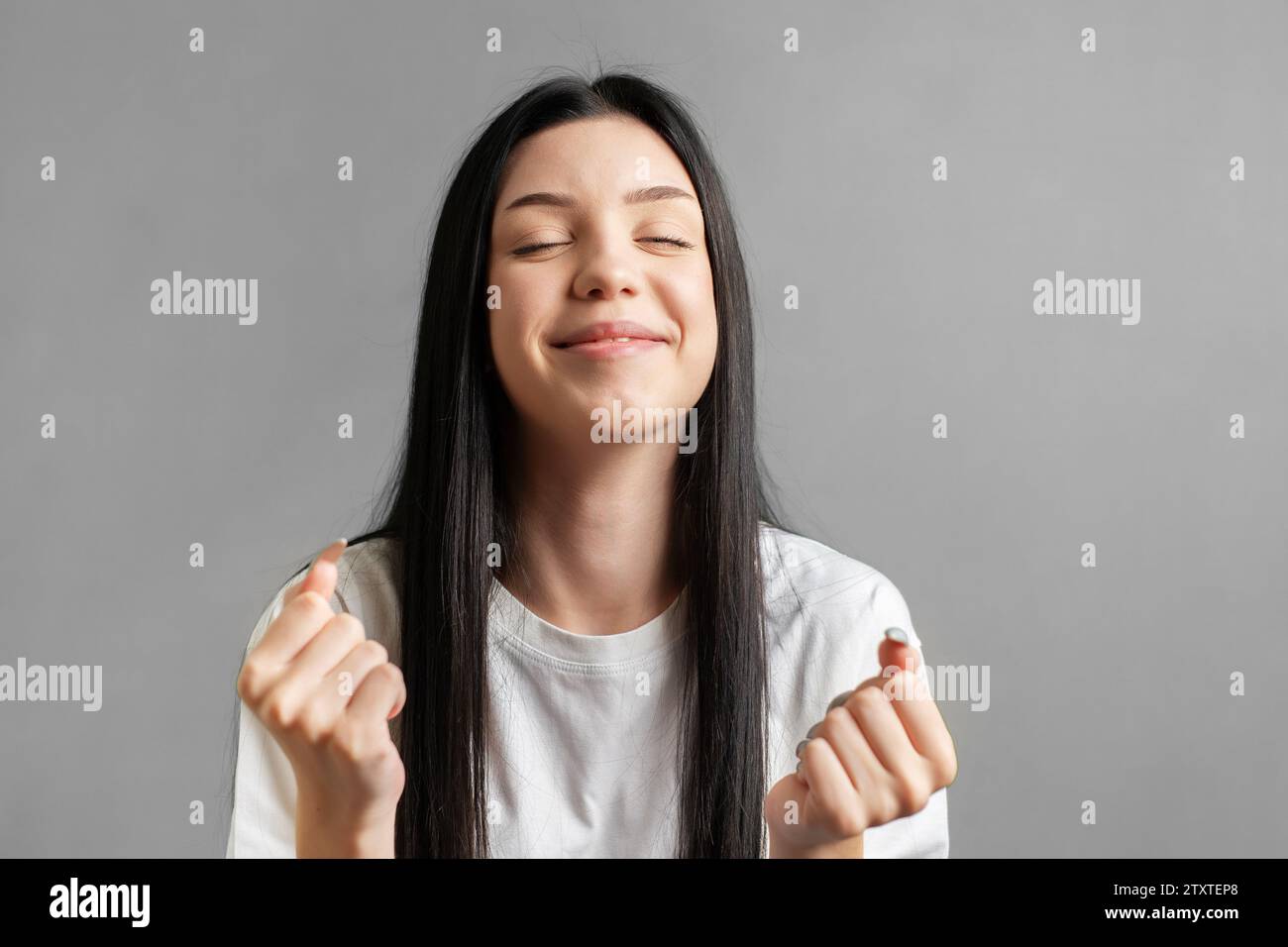 Portrait of a young teenager girl who rejoices in success Stock Photo ...