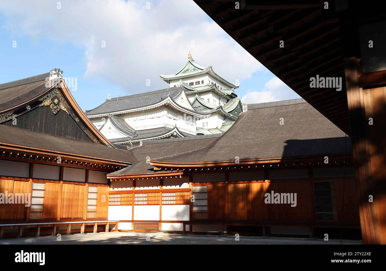A photo shows castle tower (rear) and residential building of Nagoya ...
