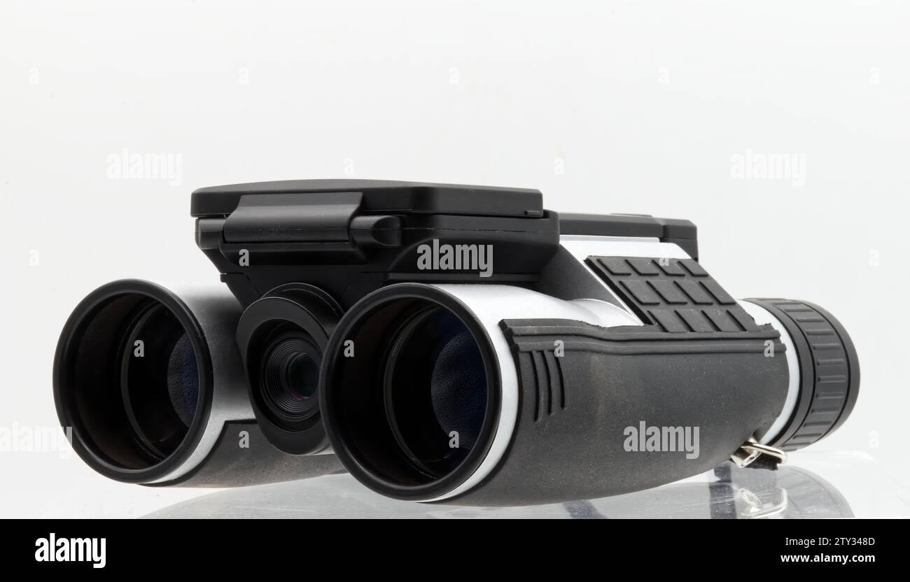 Modern Binoculars with digital camera LCD display isolated on white ...