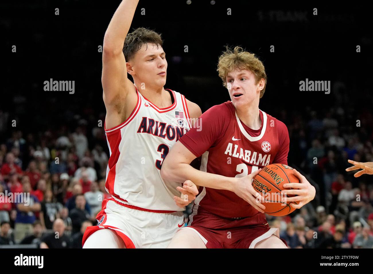 Alabama forward Sam Walters drives against Arizona guard Pelle Larsson ...