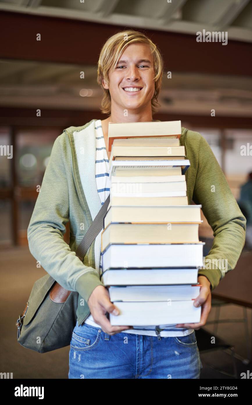 Pile, books or portrait of happy man in a library for knowledge or ...