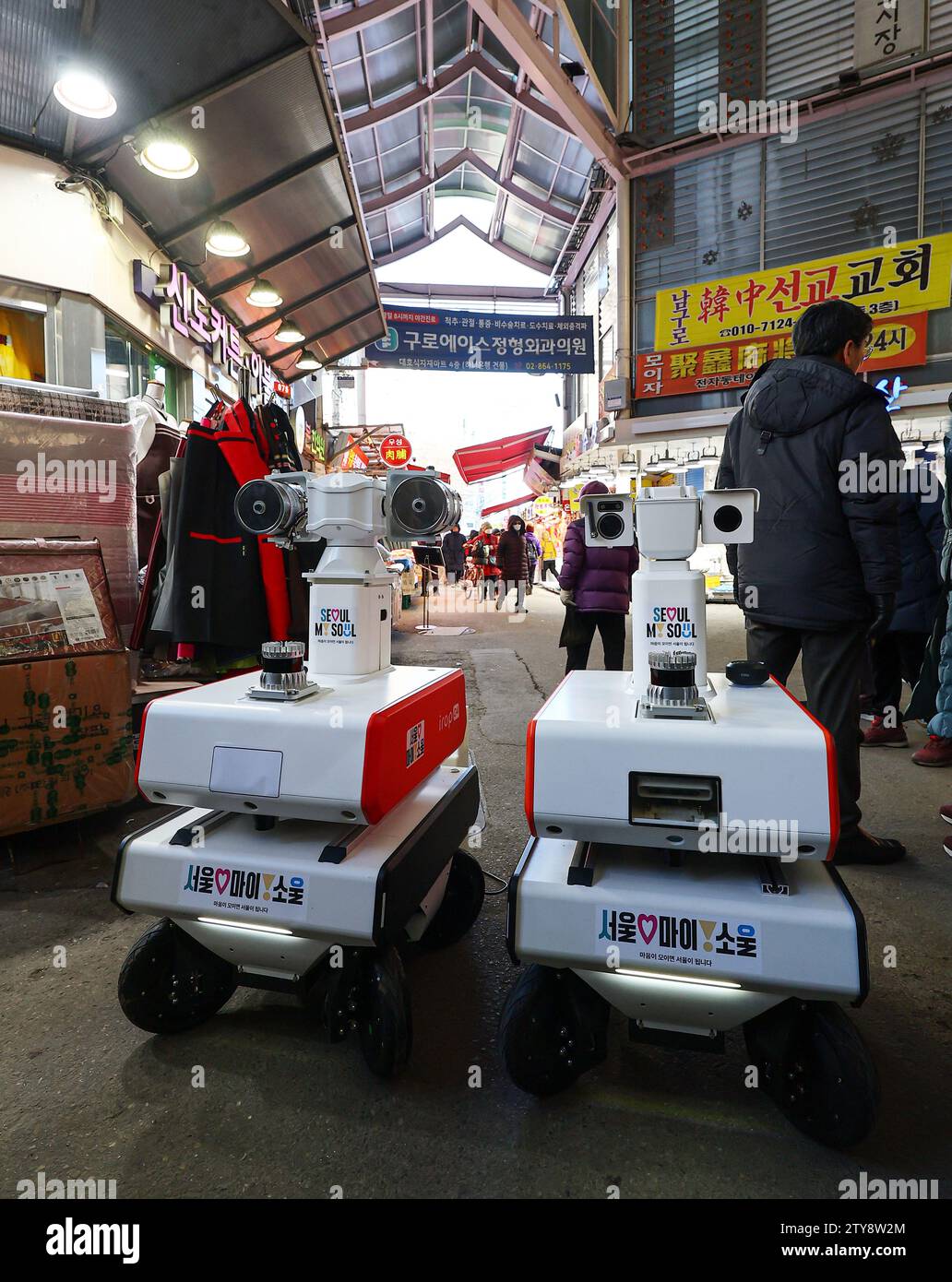 21st Dec, 2023. Patrol robots at traditional market Patrol robots are ...