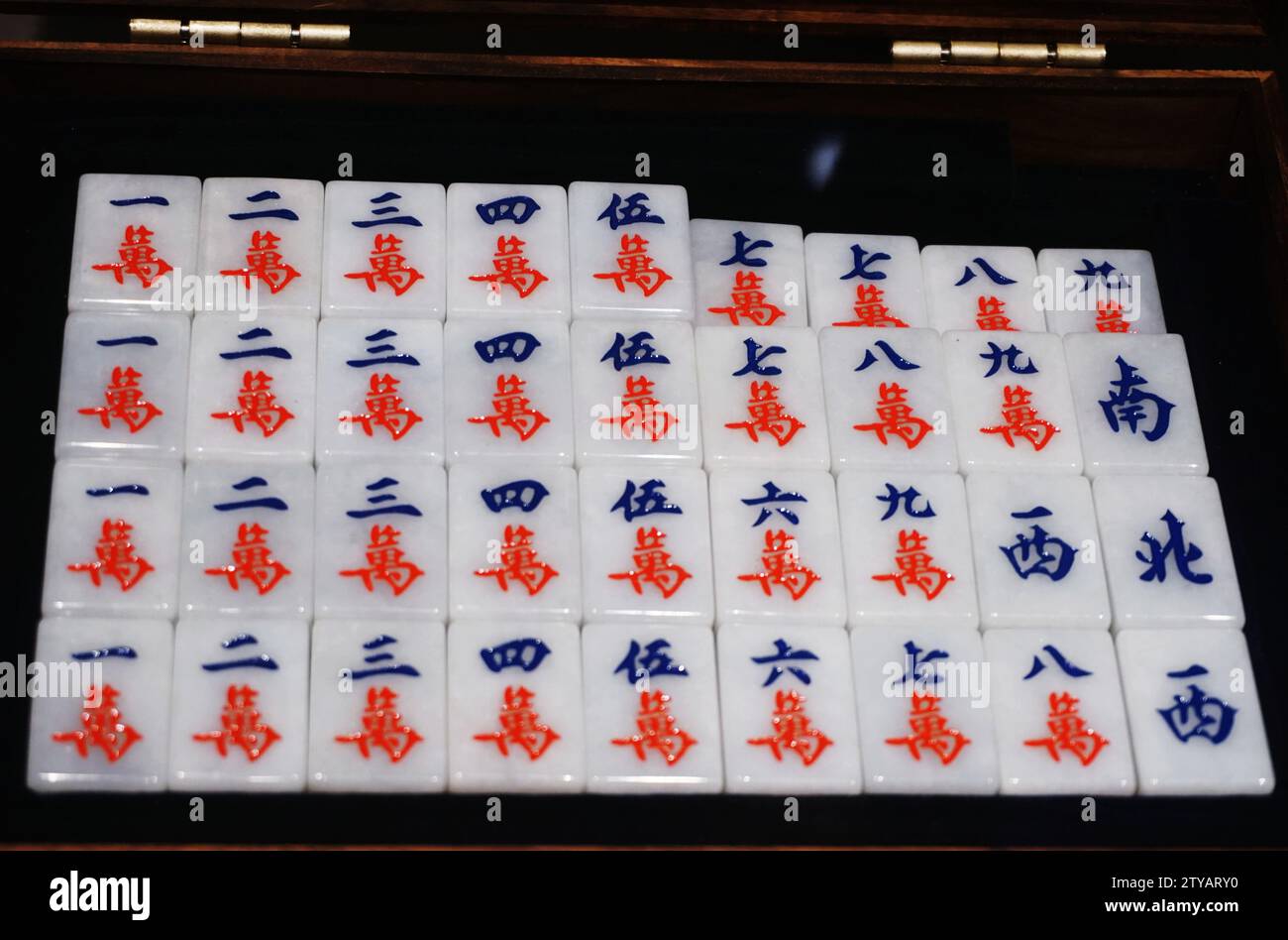 Hangzhou, China. 21st Dec, 2023. A jade mahjong set is being previewed ...