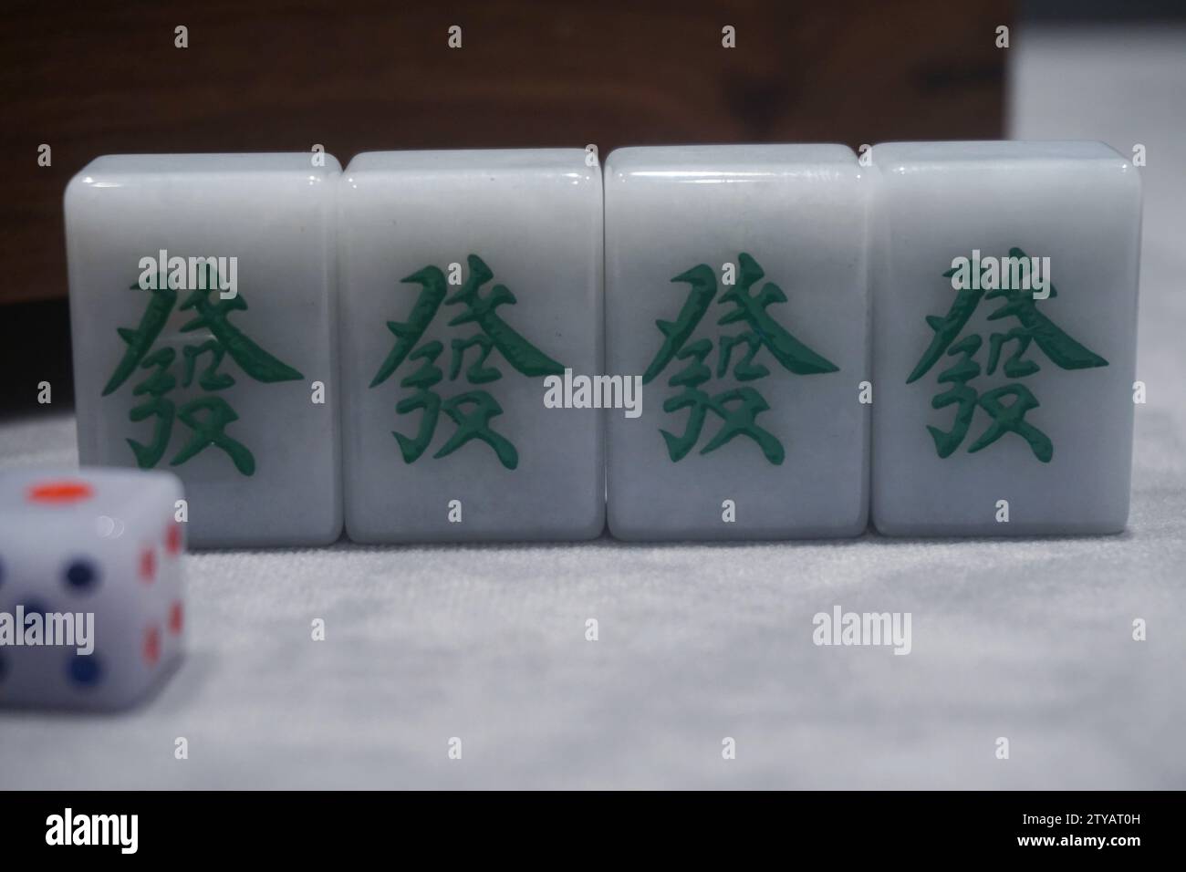 Hangzhou, China. 21st Dec, 2023. A jade mahjong set is being previewed ...