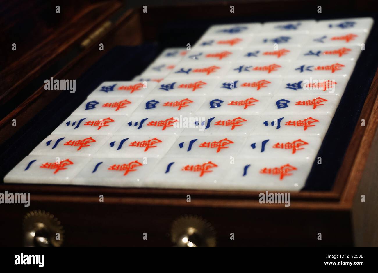 Hangzhou, China. 21st Dec, 2023. A jade mahjong set is being previewed ...