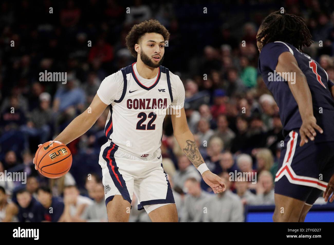 Gonzaga forward Anton Watson (22) controls the ball while pressured by ...