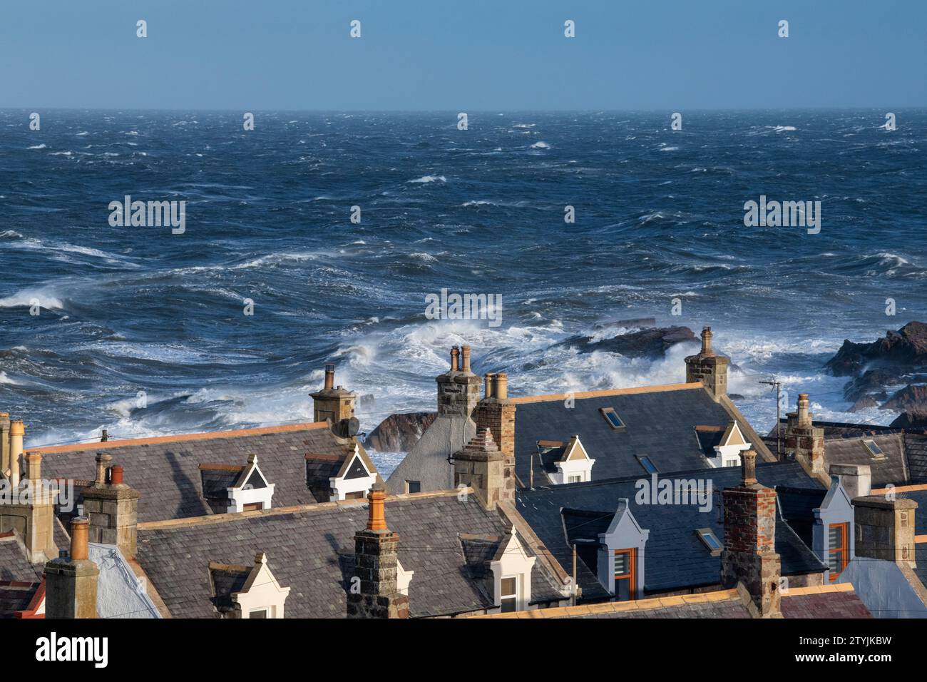 Findochty bay along the coast with a turbulent sea. Findochty ...