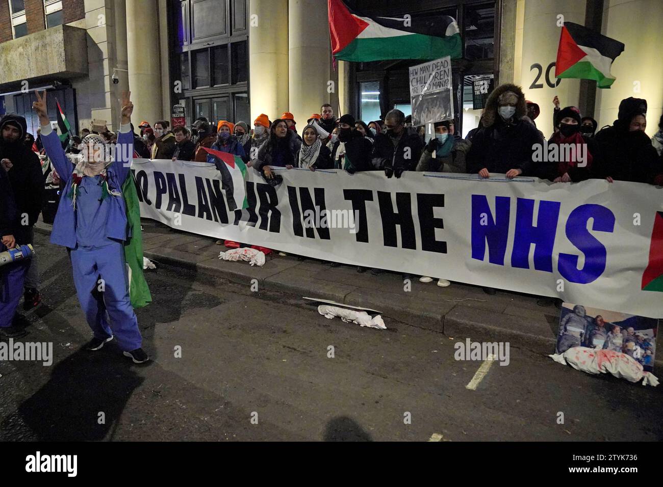 Health workers form a blockade in Soho Square during a protest outside ...