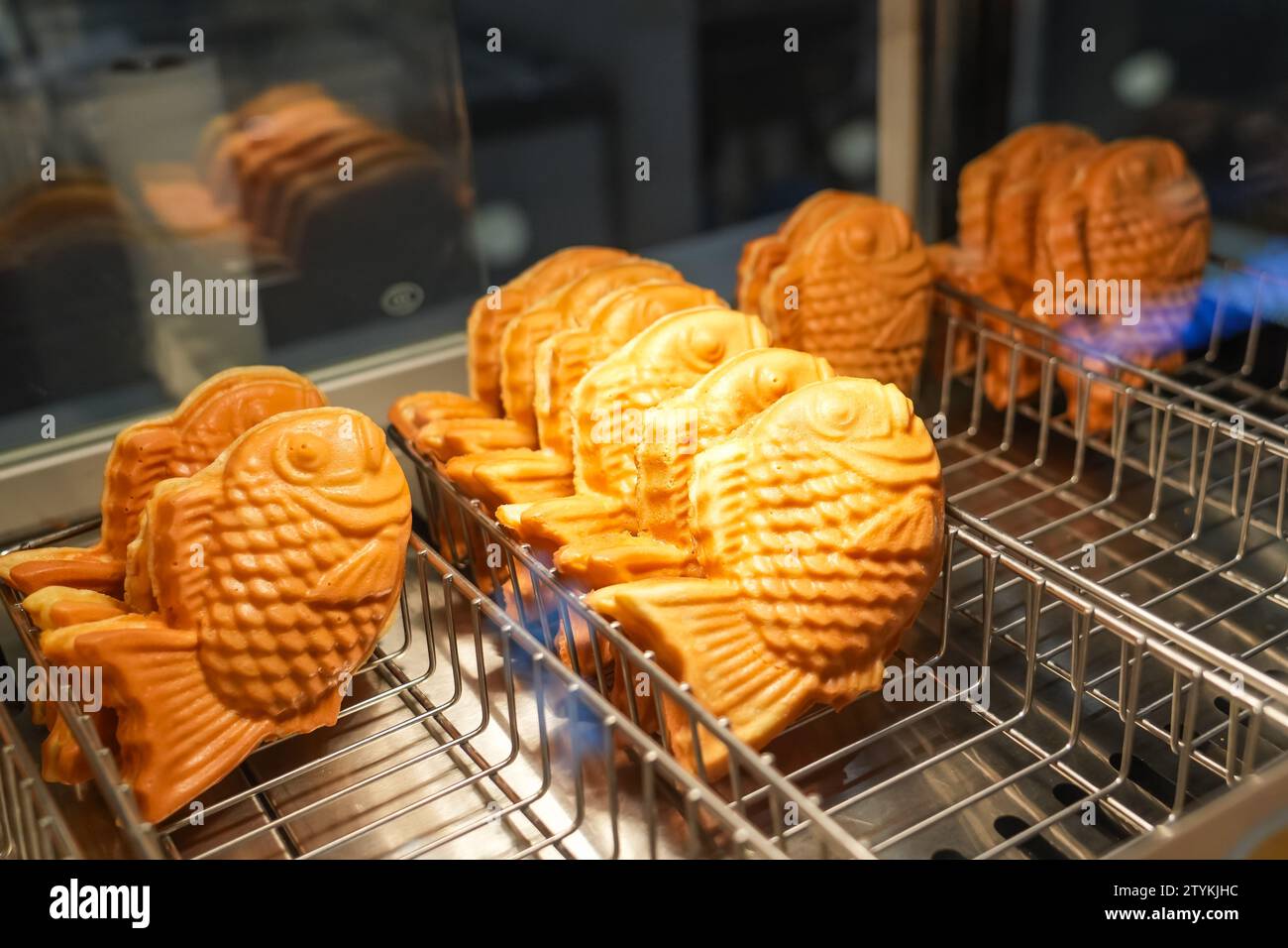 Waffle taiyaki fish pastries on display at a coffee shop Stock Photo ...