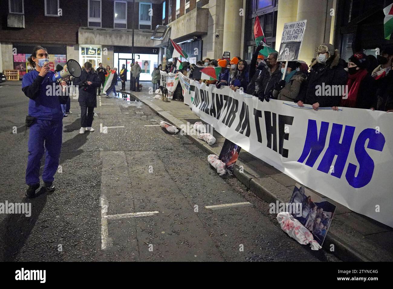 Health workers form a blockade in Soho Square during a protest outside ...