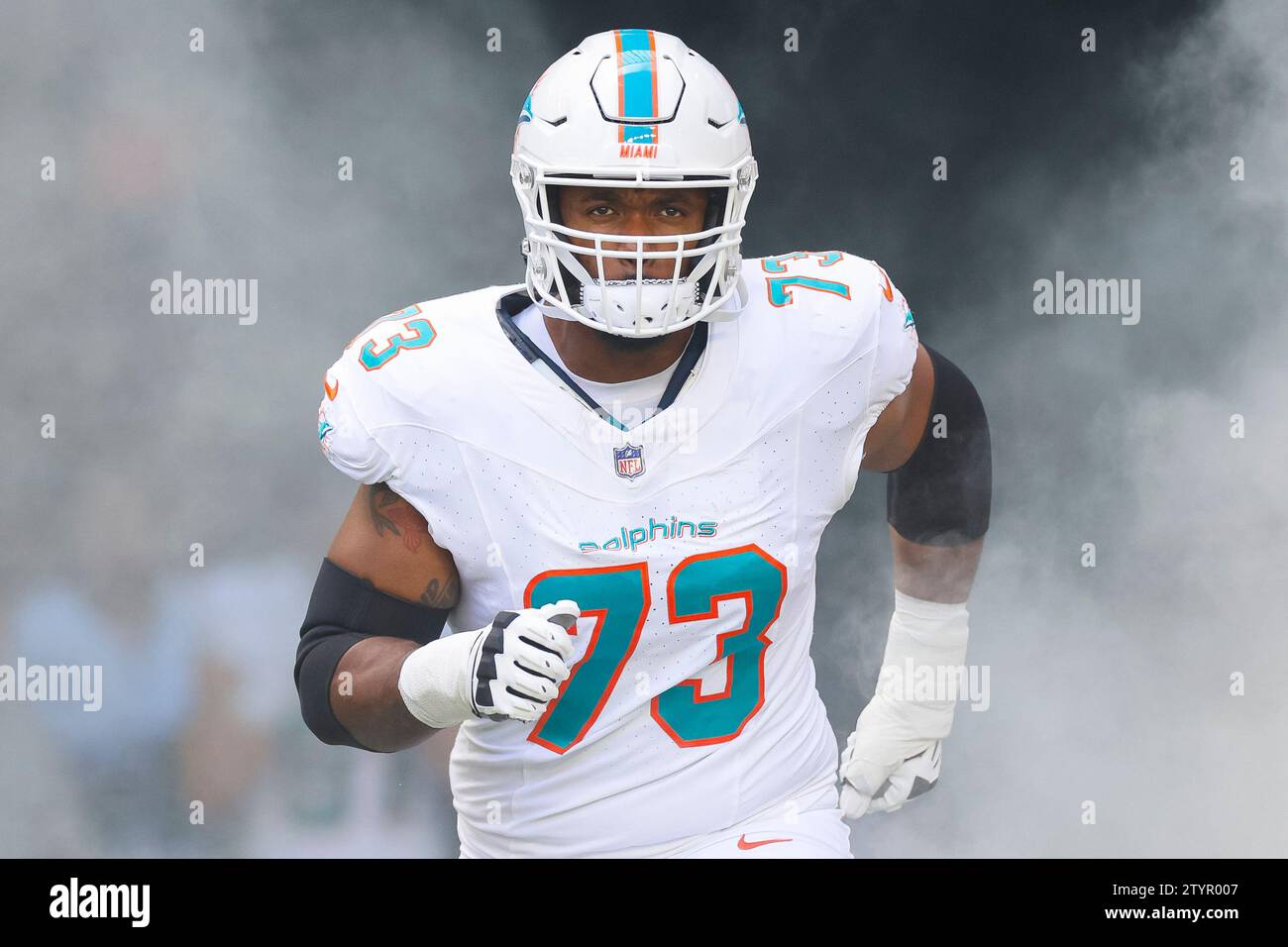 Miami Dolphins guard Austin Jackson (73) runs onto the field during ...