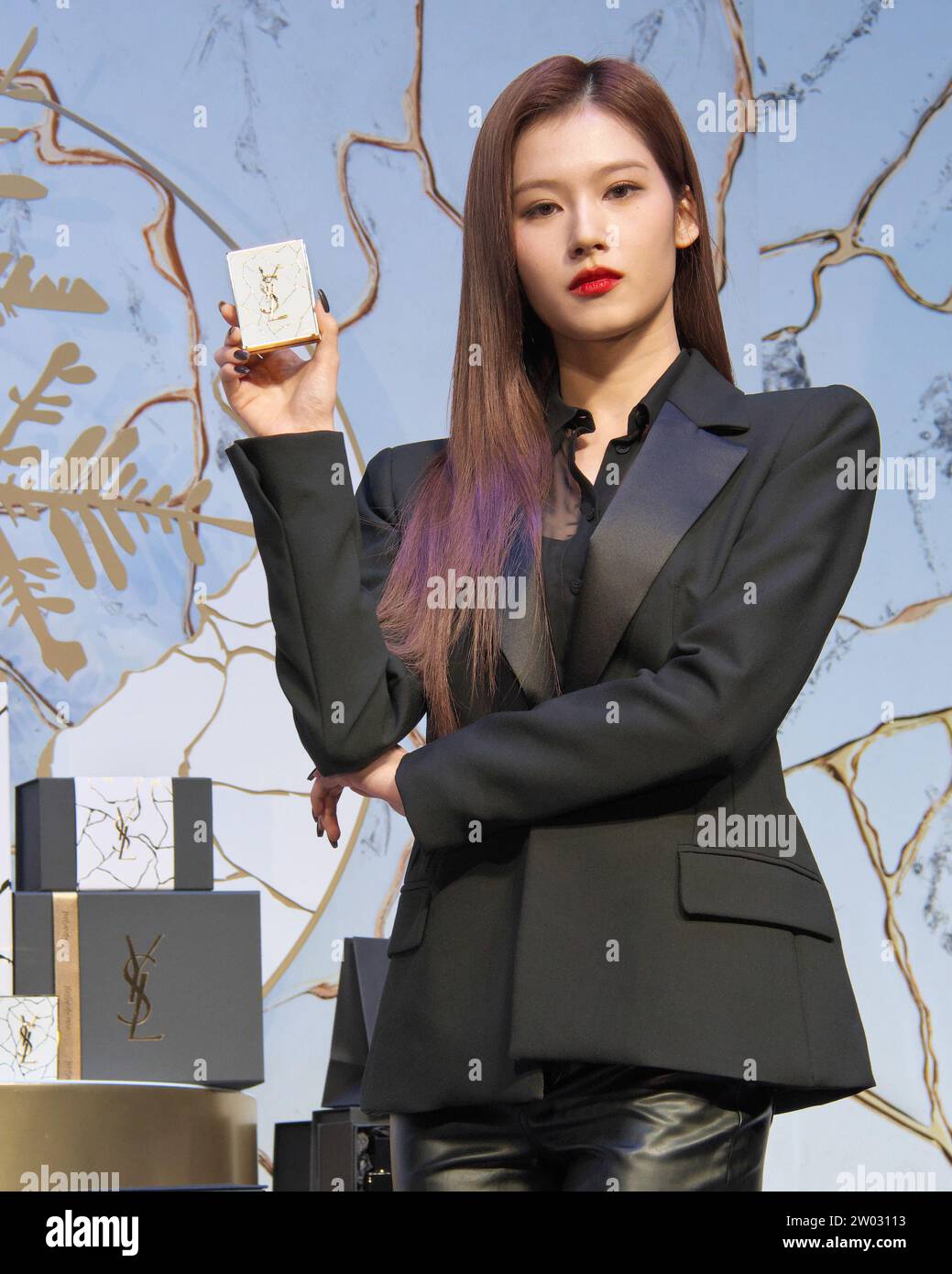 Sana of K-pop group TWICE attends a press conference for Yves Saint ...