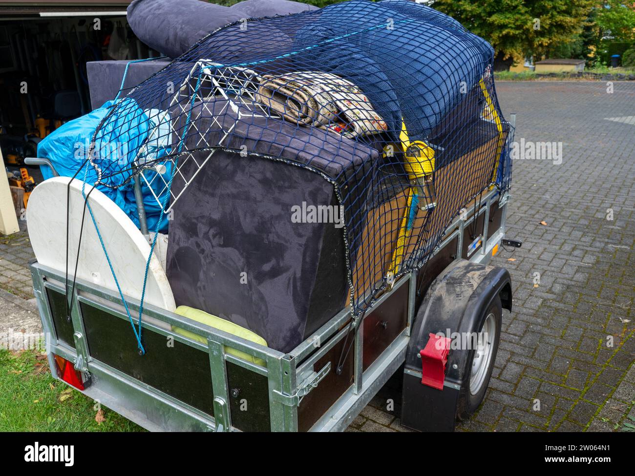 Trailer full of bulky waste Stock Photo - Alamy