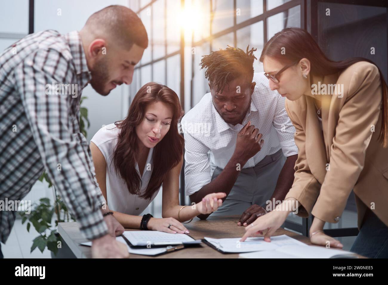 Ambitious smart employee speaks in a meeting and shares her opinion on ...