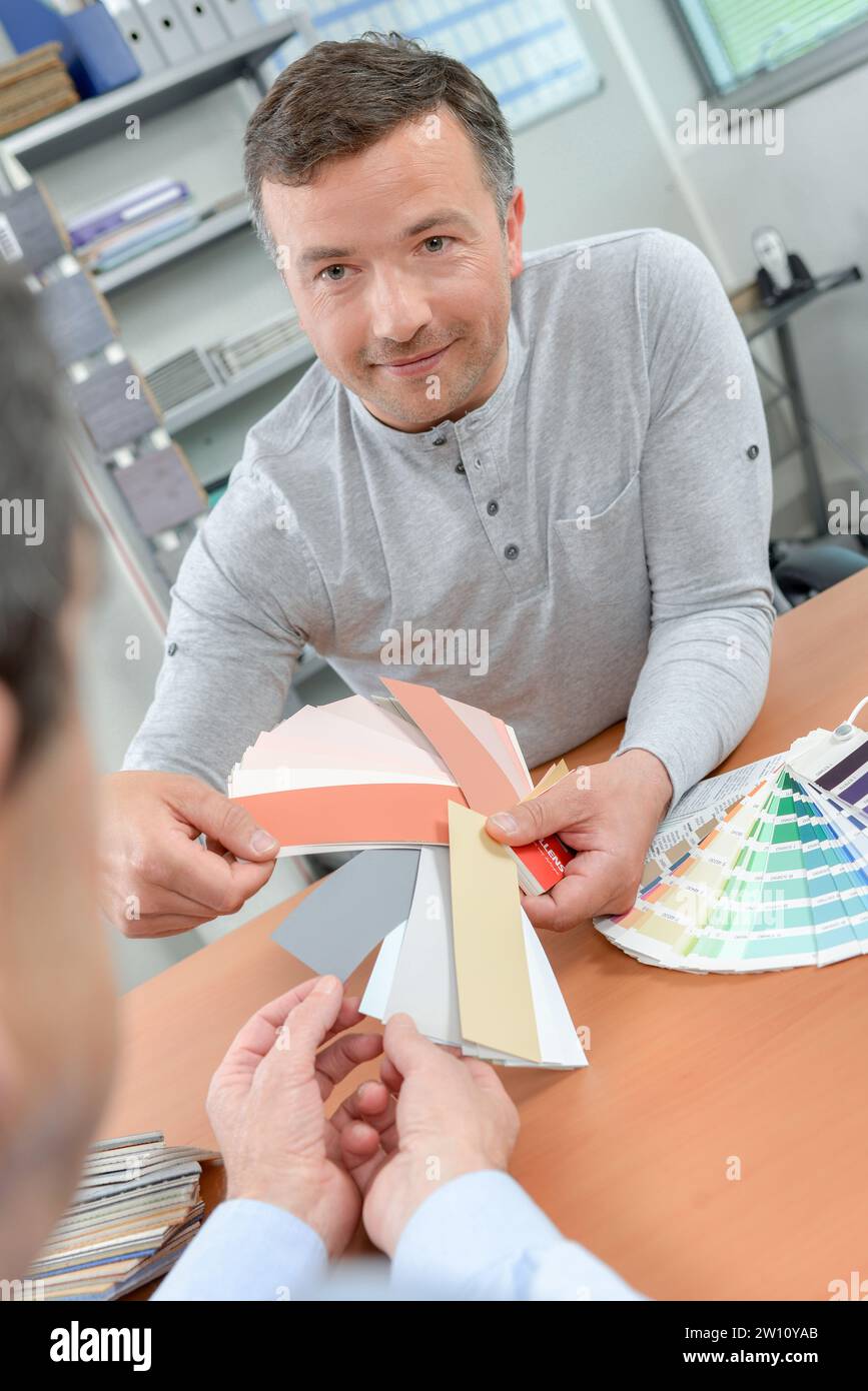 a man showing color samples Stock Photo - Alamy