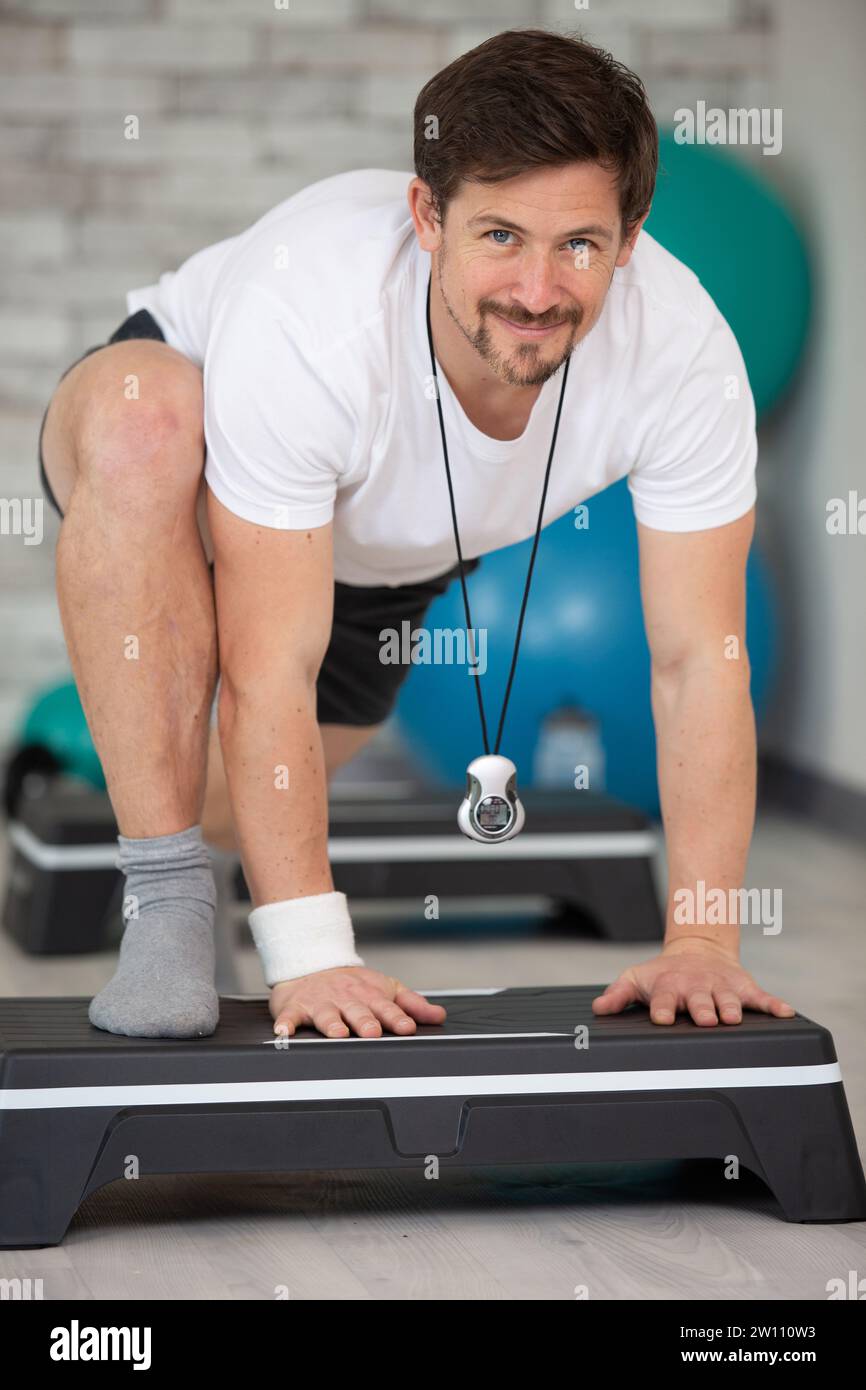man doing step exercise routine Stock Photo - Alamy