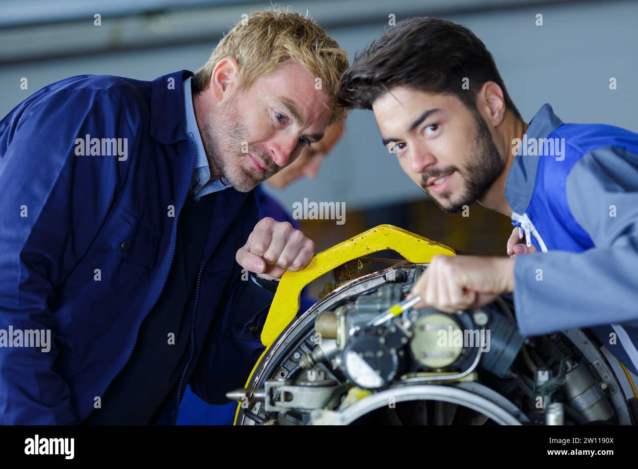 two modern mechanics at work Stock Photo - Alamy