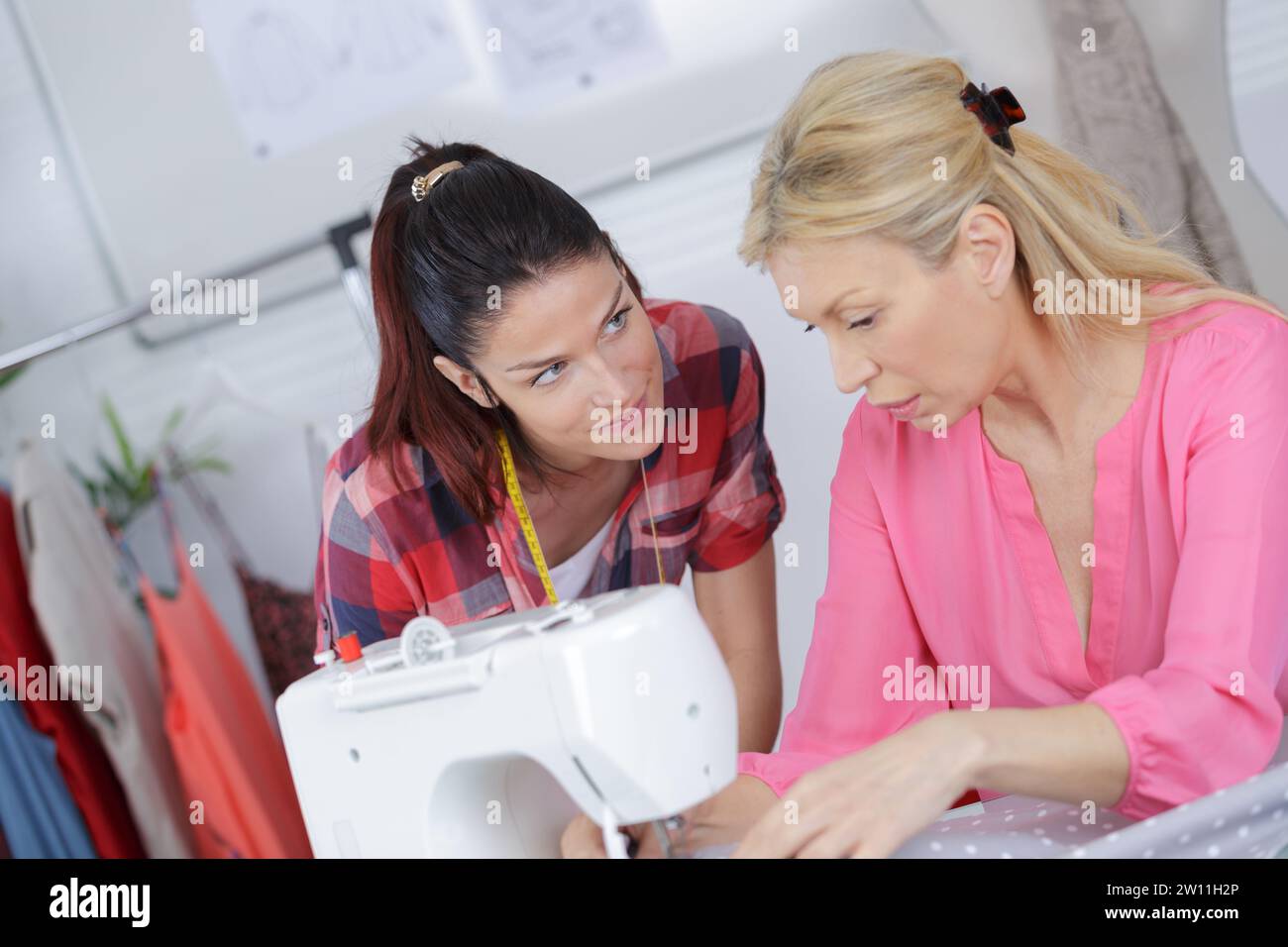 student with teacher in dressmaking class Stock Photo - Alamy