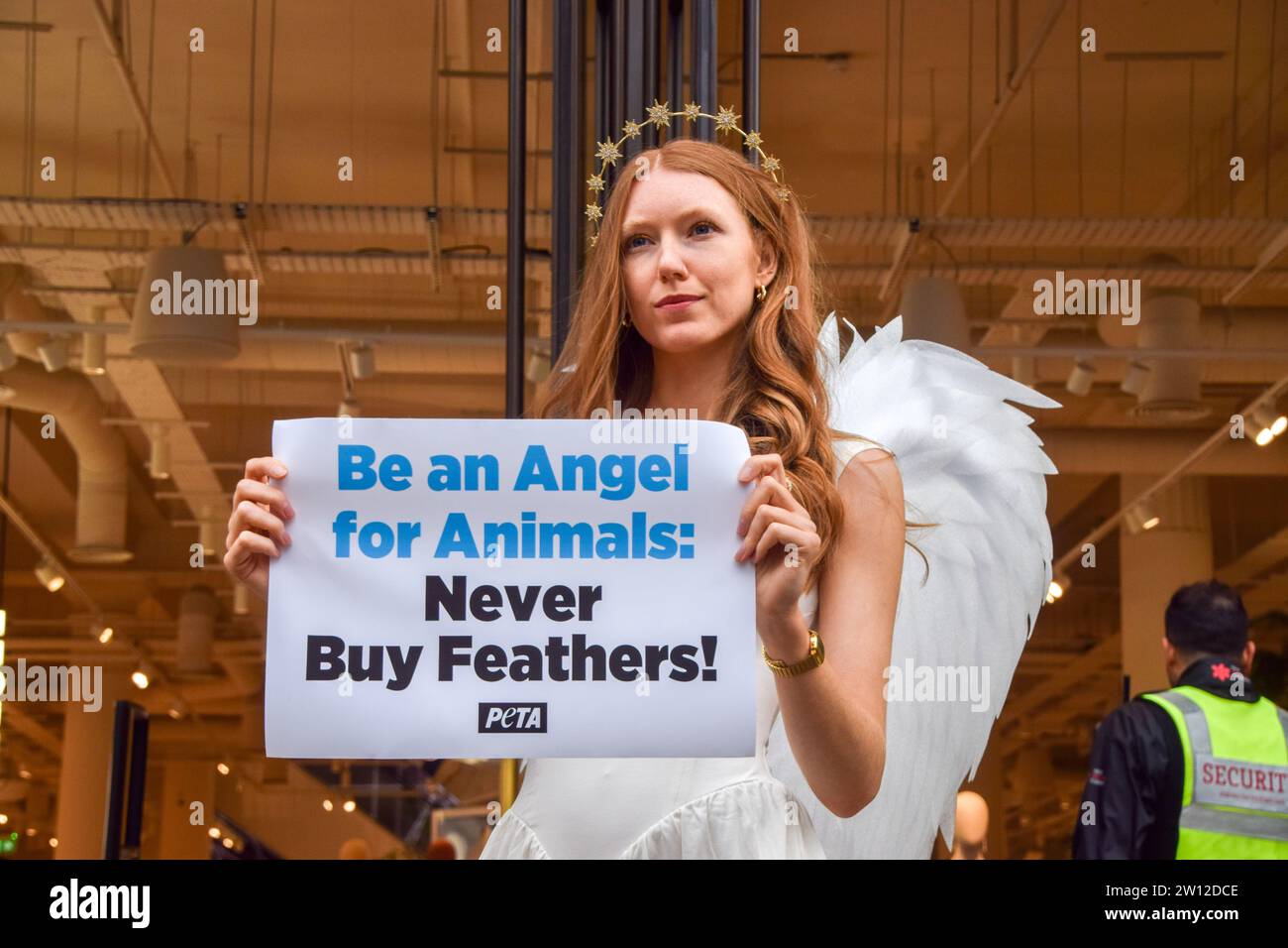 London, UK. 20th December 2023. A PETA activist dressed as an angel ...