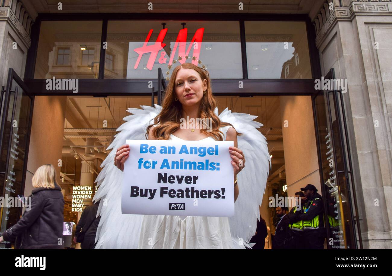 London, UK. 20th December 2023. A PETA activist dressed as an angel ...