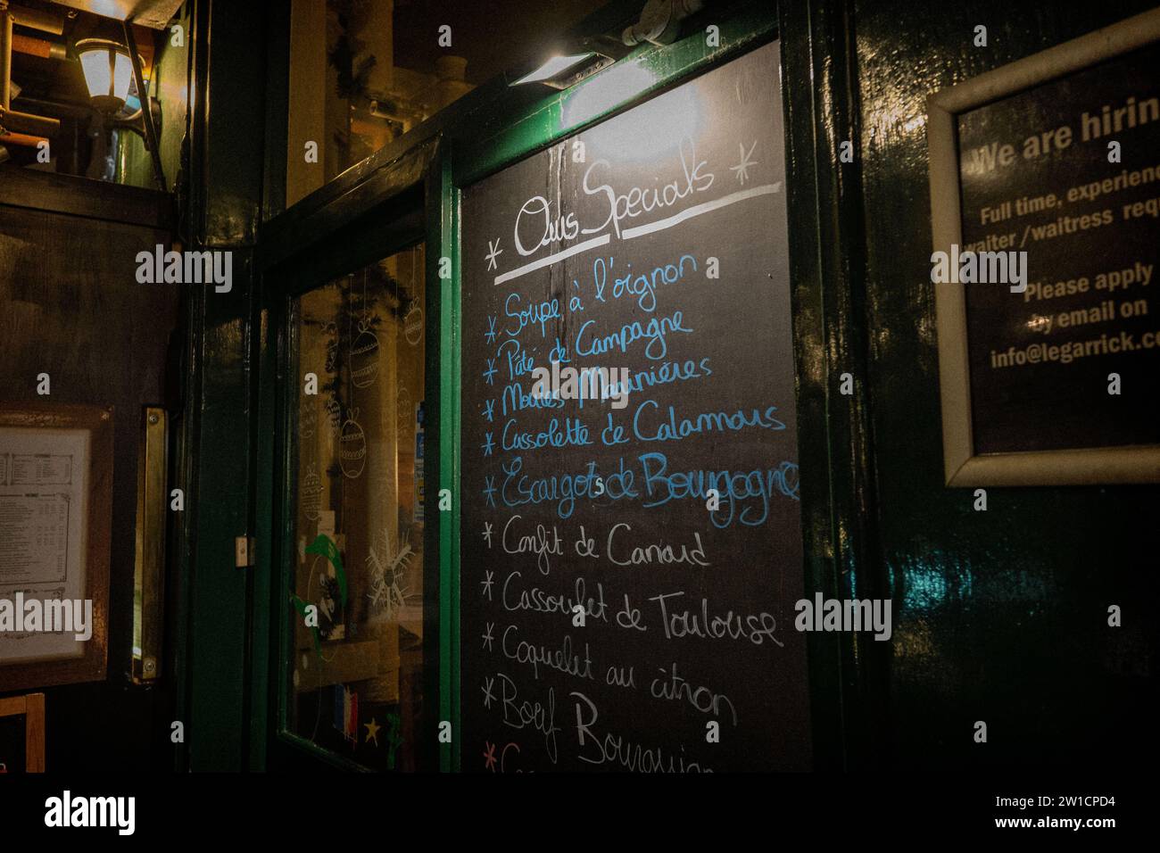 handwritten menu of Fresh dishes on a chalkboard outside a London ...