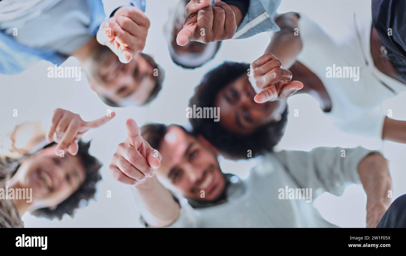 Closeup portrait, bottom view, happy faces of different team employees ...