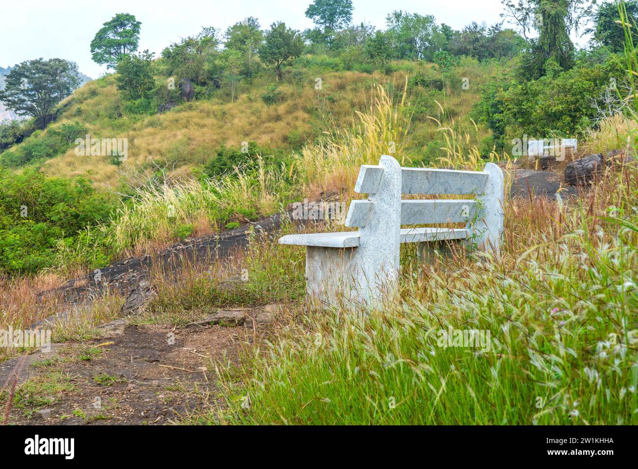 Mountain Park stone bench Stock Photo - Alamy
